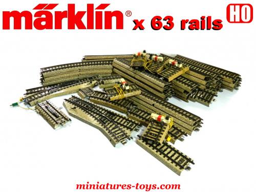 Un lot de 63 rails ferroviaires en métal 3 voies de Marklin au H0 HO ...